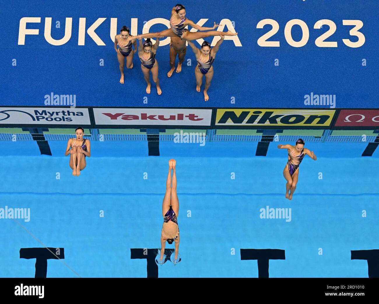 The China team competes in the team acrobatic routine final of artistic ...