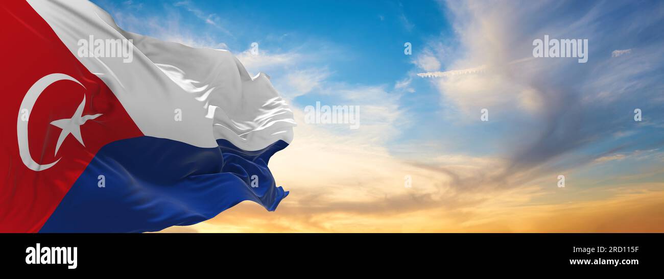 official flag of Mersing, Johor Malaysia at cloudy sky background on ...