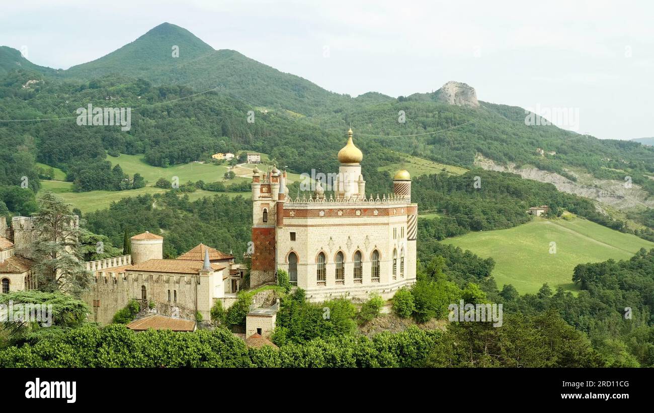 Aerial drone panoramic view of the Rocchetta Mattei castle in Italy on ...