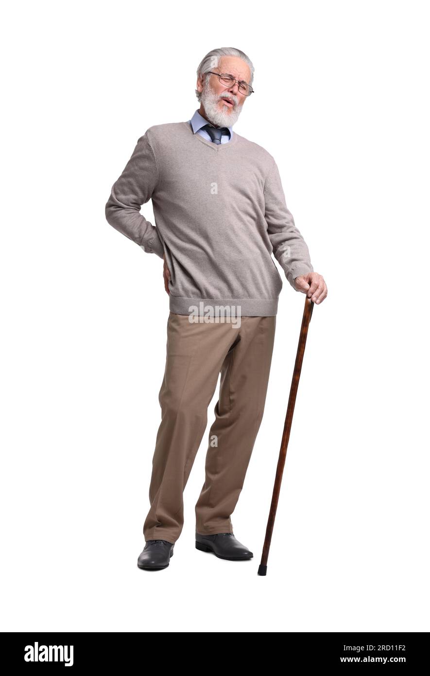 Senior man with walking cane suffering from back pain on white ...