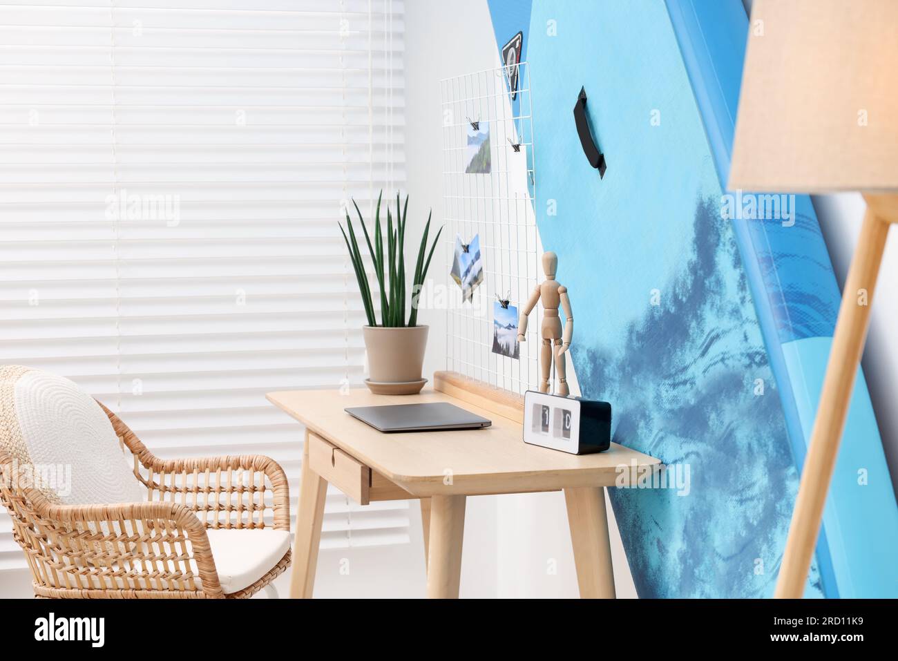 SUP board and workplace in room. Interior design Stock Photo - Alamy