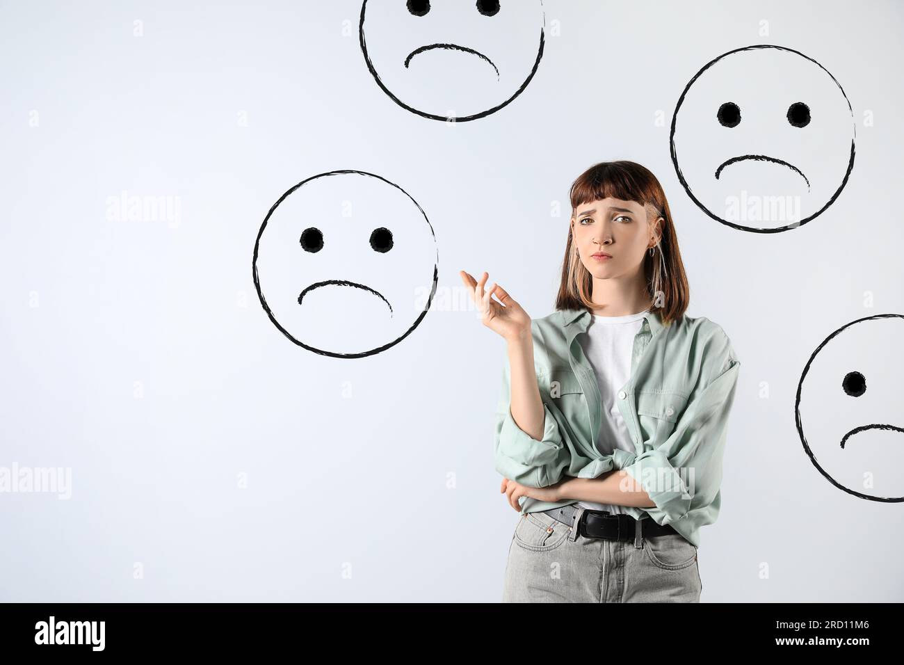 Complaint. Dissatisfied girl surrounded by illustrations of sad face on ...