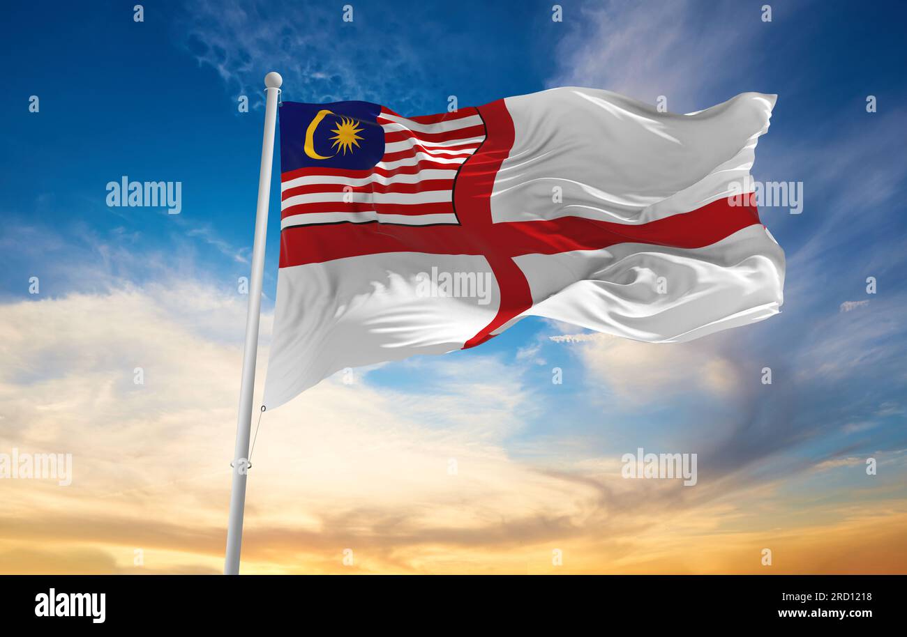 official flag of Naval Ensign 1963 1968 Malaysia at cloudy sky background on sunset, panoramic ...