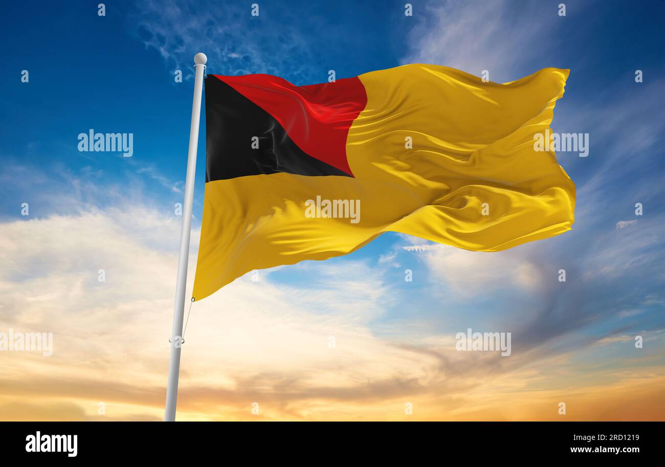 official flag of Negeri Sembilan Malaysia at cloudy sky background on ...