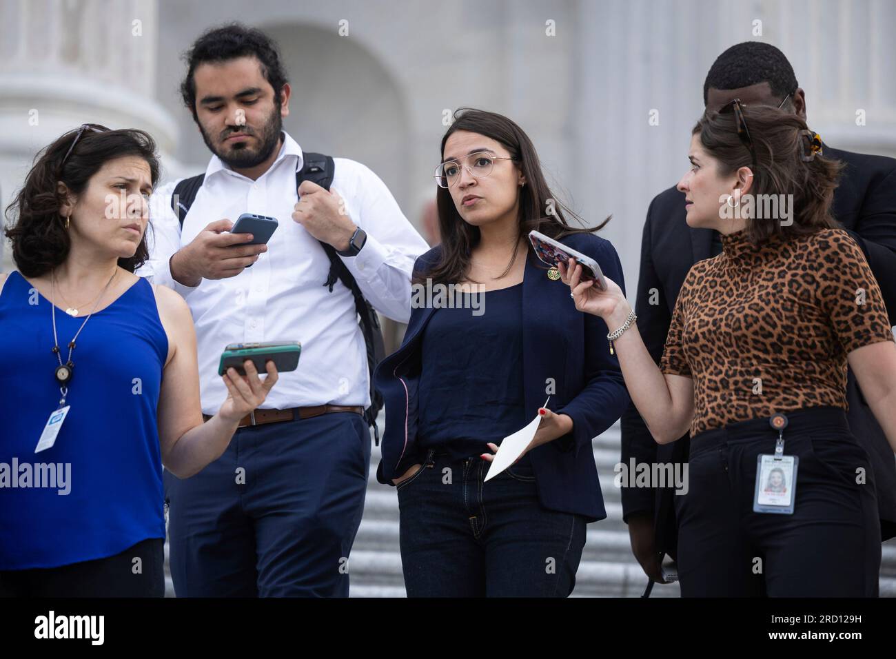 Rep. Alexandria Ocasio-Cortez (D-N.Y.) speaks with reporters as she ...