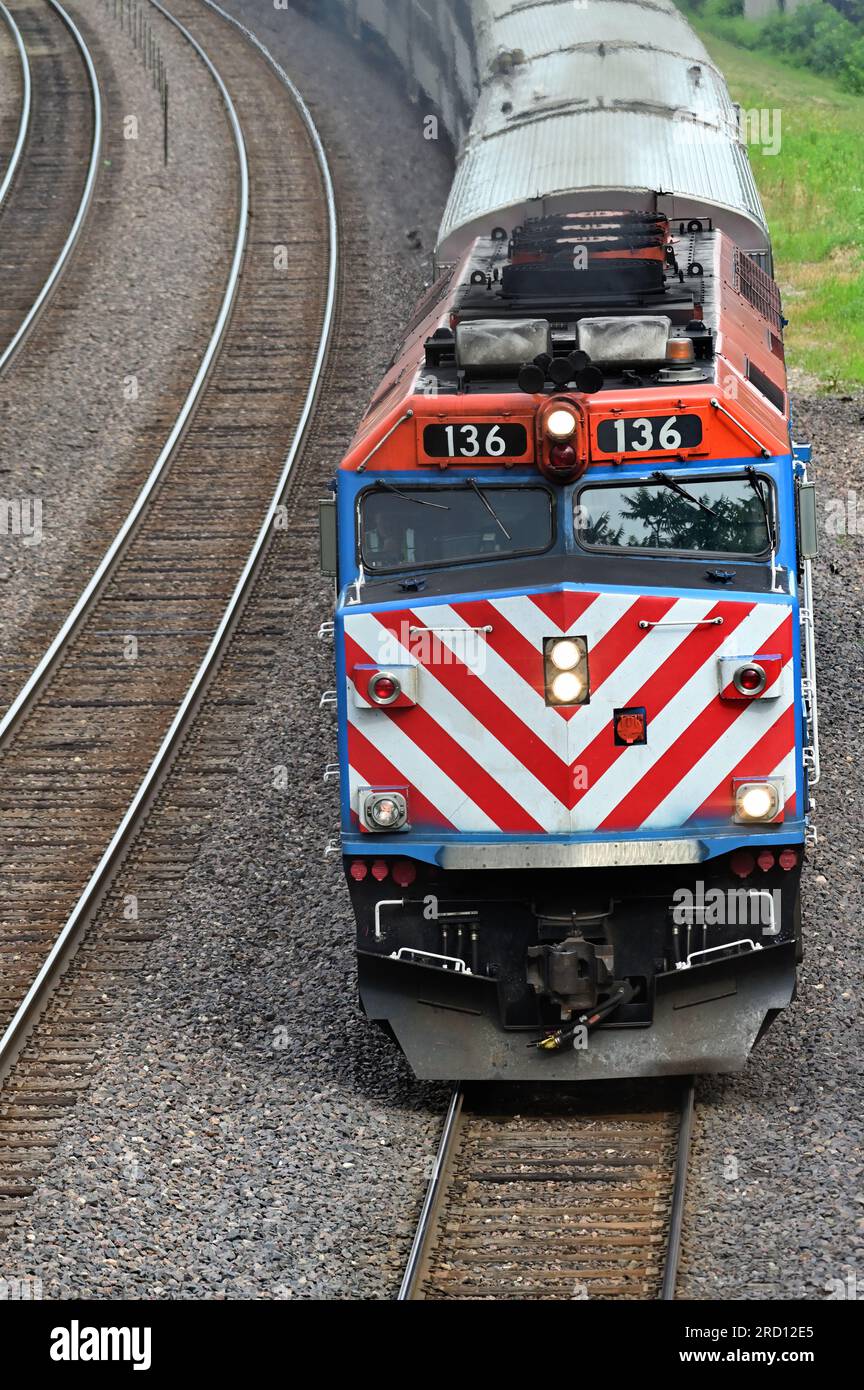 Wheaton, Illinois, USA. A Metra commuter train on a curve just after ...