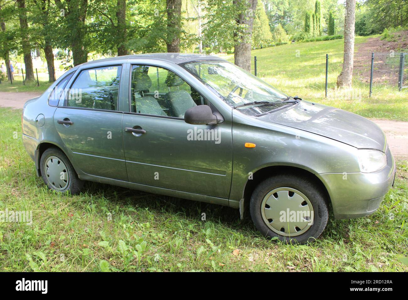 Gray Lada sedan parked on grass in Eglaine, Latvia Stock Photo - Alamy