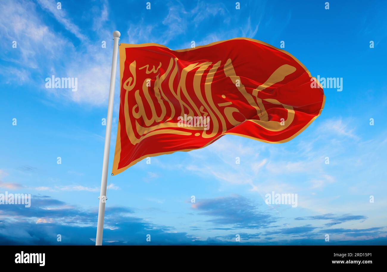 flag of Historic peoples Moors Grenade at cloudy sky background ...