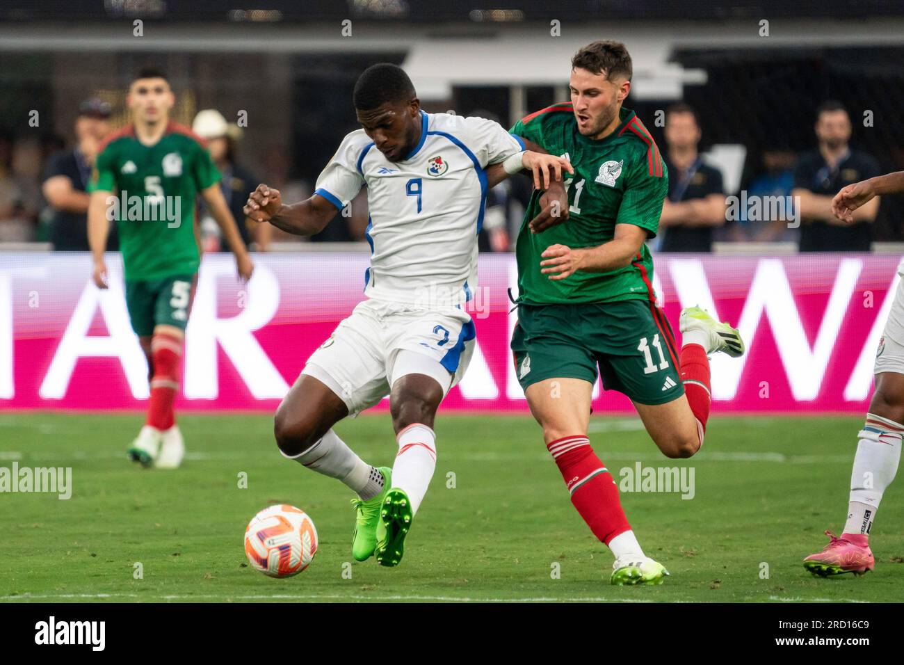 Panama forward Azarías Londoño (9) shields off Mexico forward Santiago ...