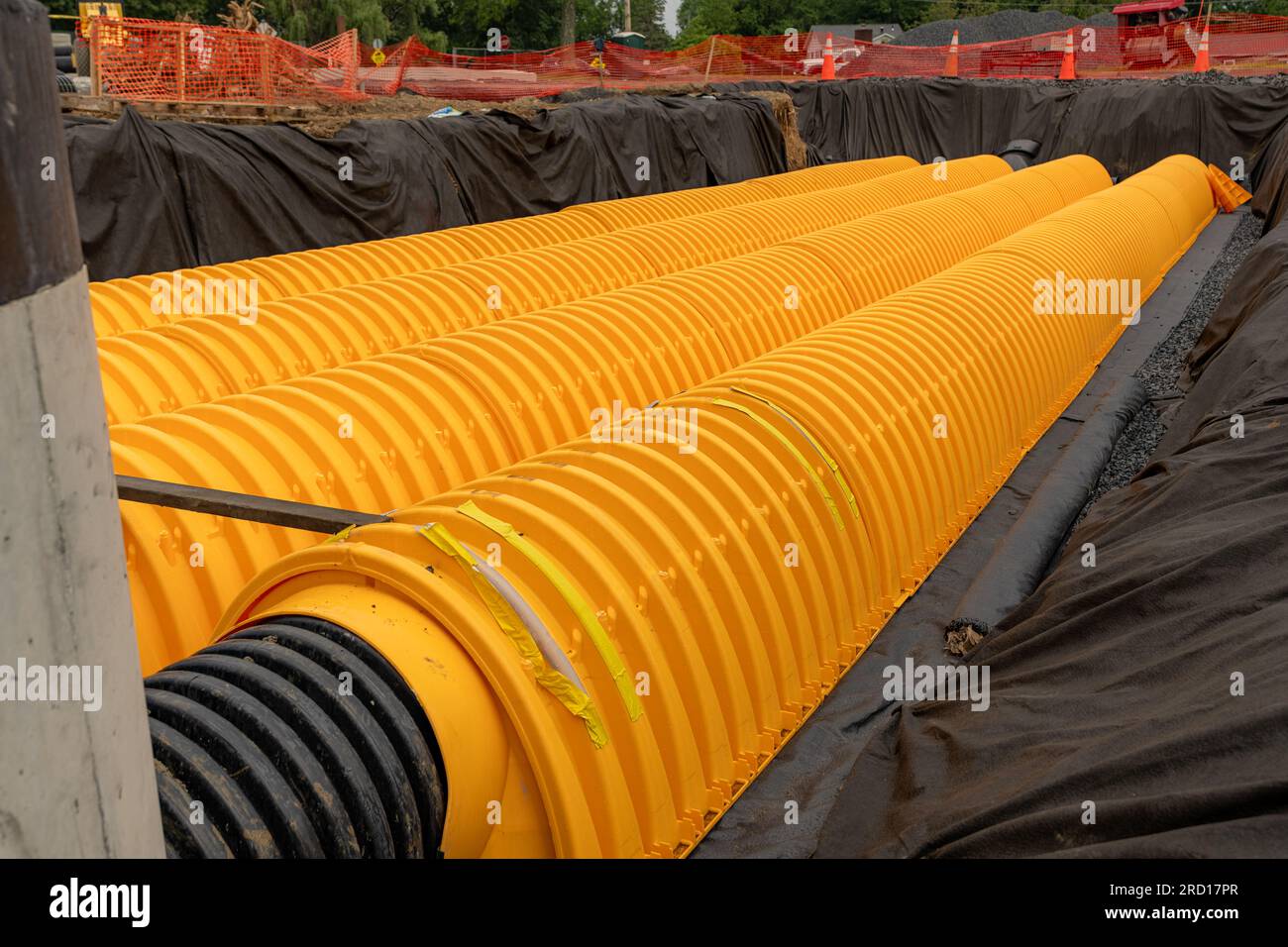 Yellow underground storm water detention mitigation units on a ...