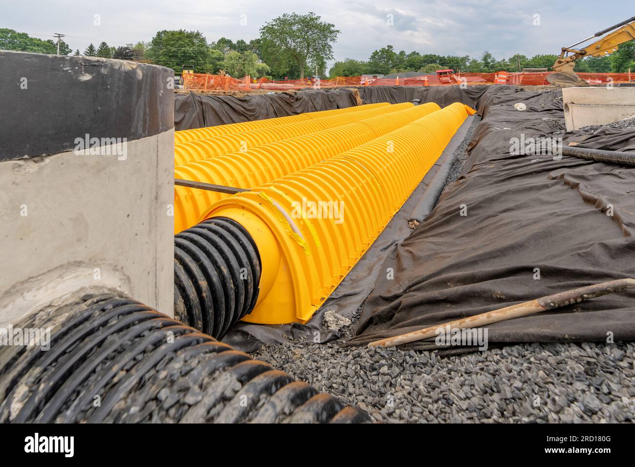 Yellow underground storm water detention mitigation units on a ...