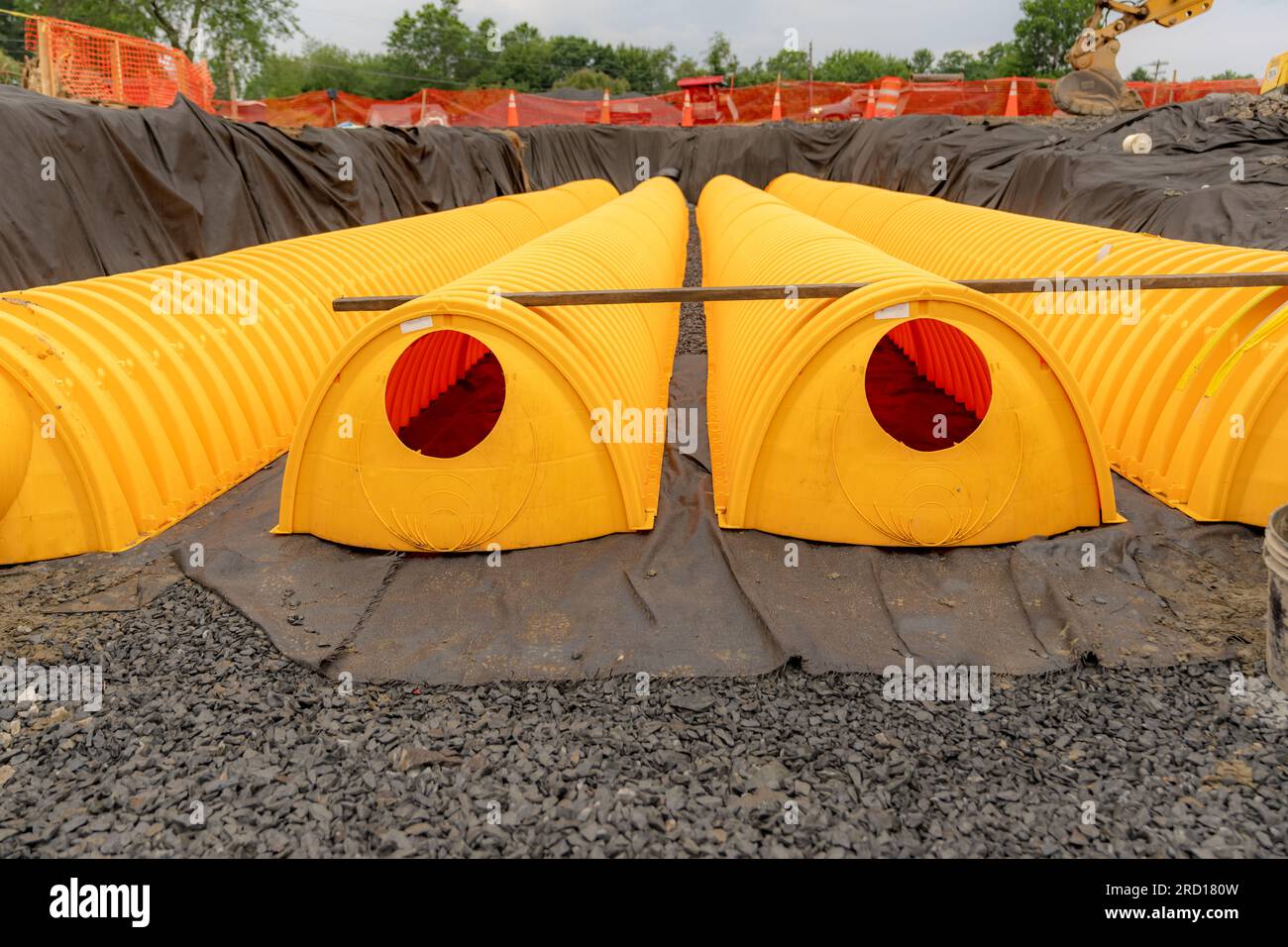 Yellow underground storm water detention mitigation units on a ...