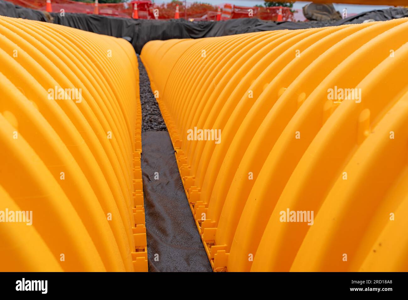 Yellow underground storm water detention mitigation units on a ...