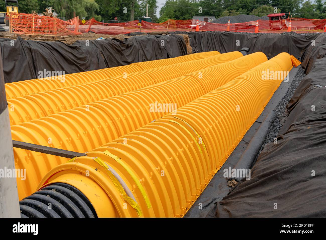 Yellow underground storm water detention mitigation units on a ...