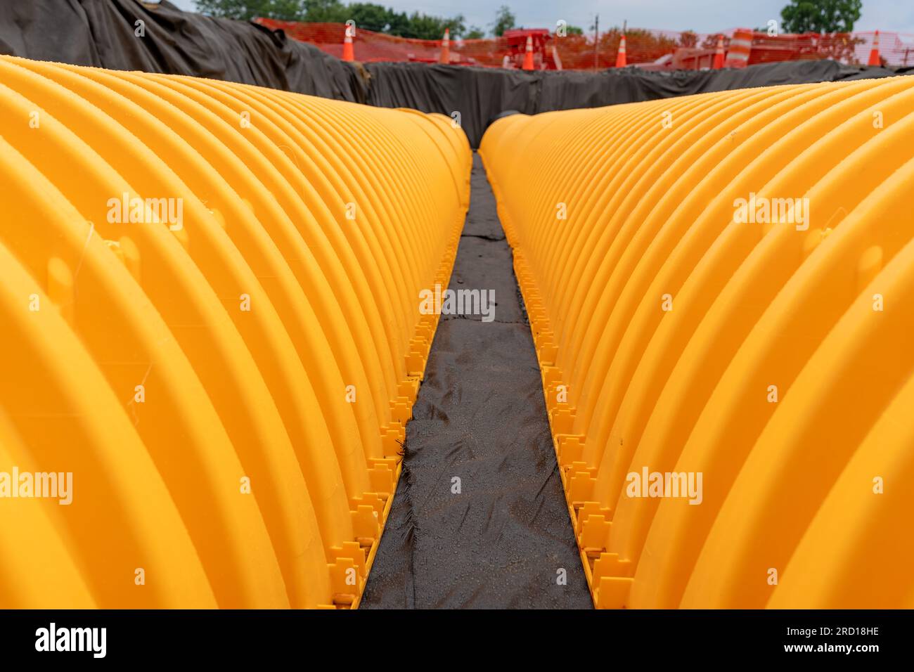Yellow underground storm water detention mitigation units on a ...