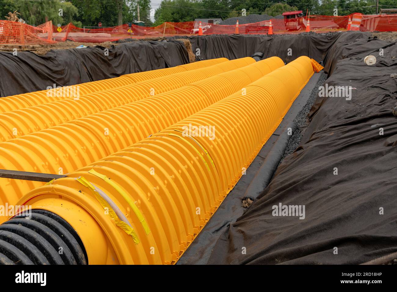 Yellow underground storm water detention mitigation units on a ...