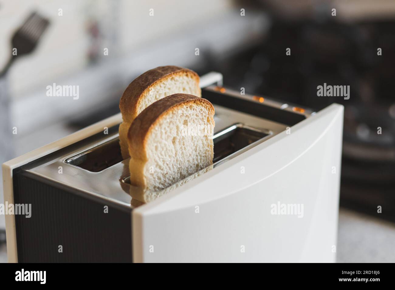 Modern toaster ready to toast white bread for a delicious breakfast ...