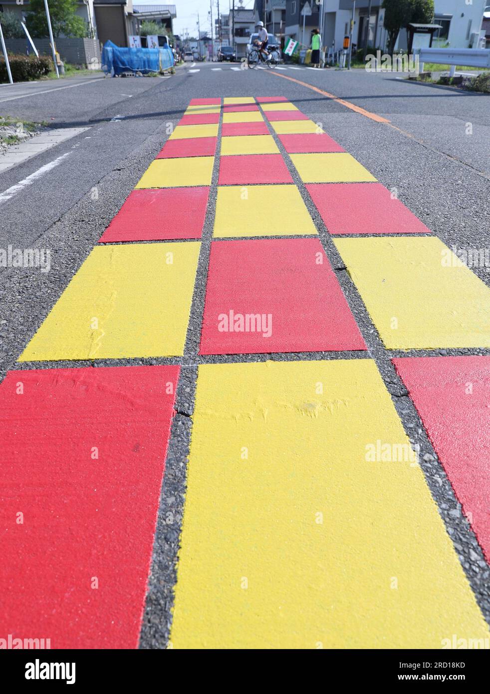 A new type of road sign is installed just this side a pedestrian ...