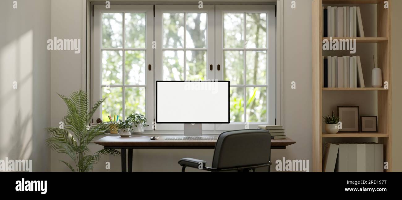 A modern minimal home workspace with computer white screen mockup on a ...