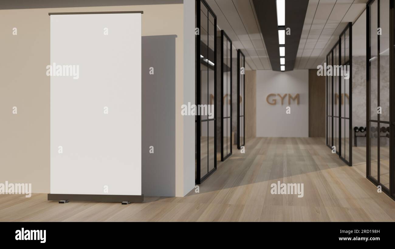 An empty mockup poster stand on the floor in a modern contemporary gym ...