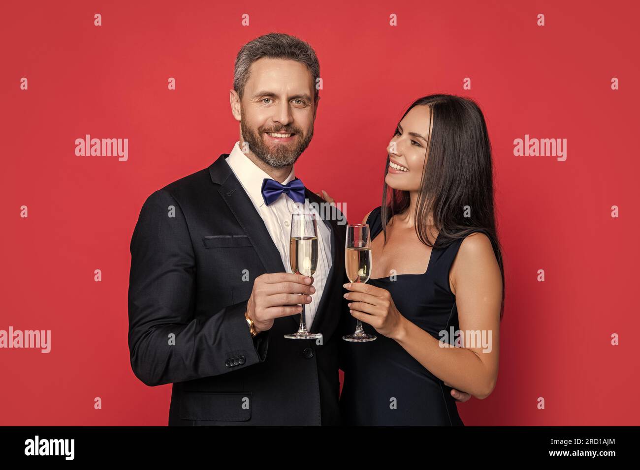 glad couple cheering and celebrate in studio. couple cheering and ...