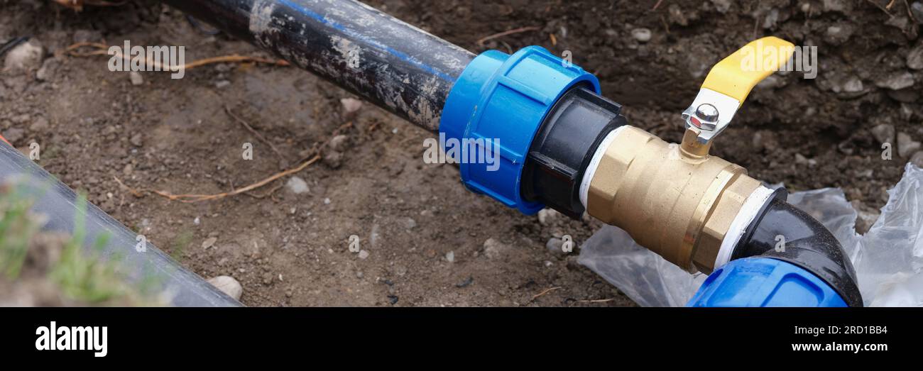 PVC outdoor plumbing system for house water supply Stock Photo - Alamy