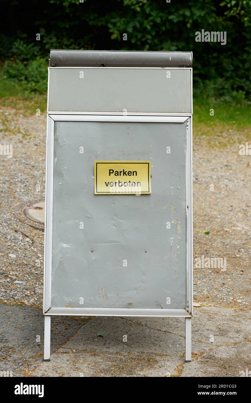 Sign with the German inscription Parken verboten at the entrance to a ...