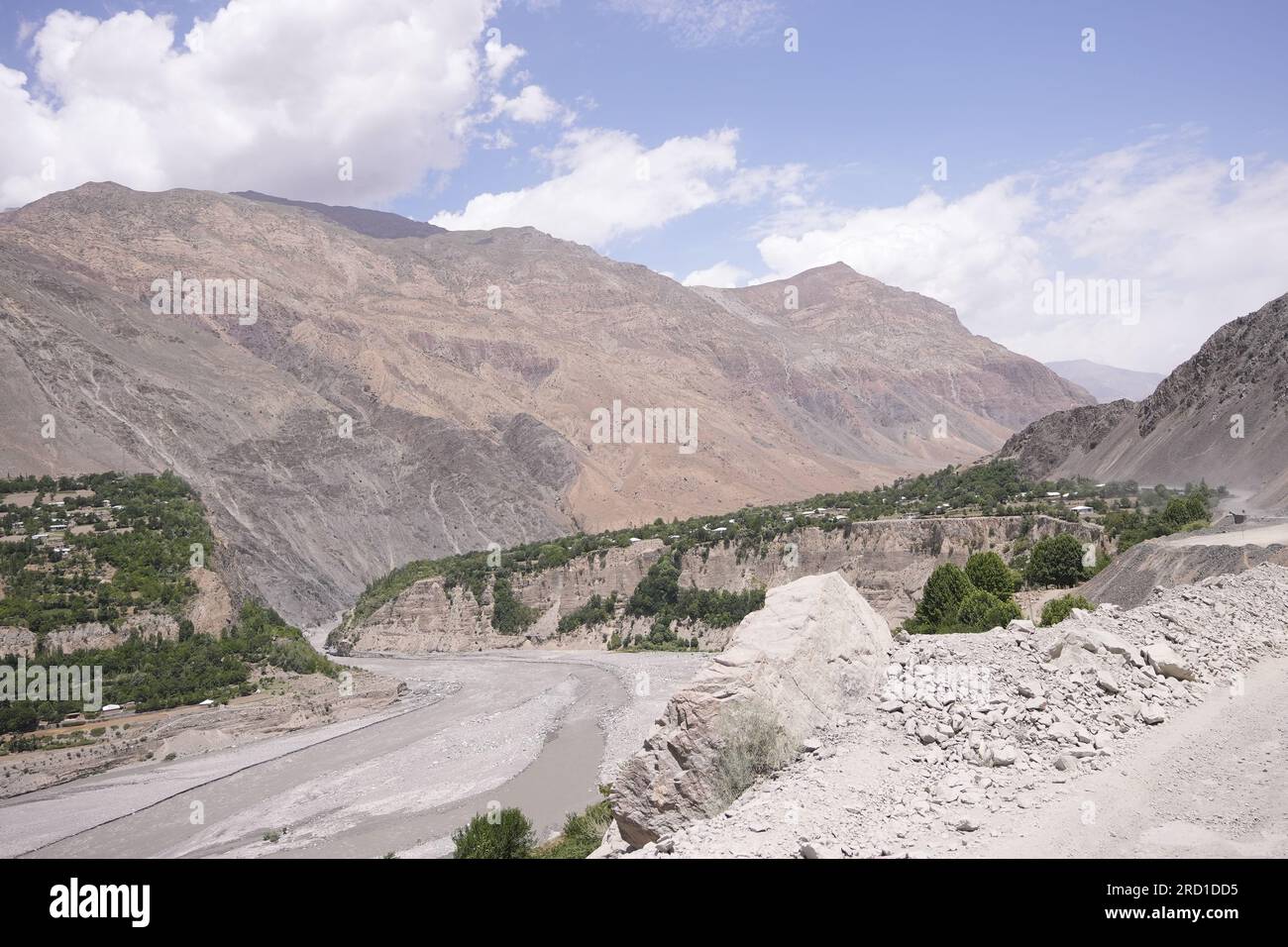 Barren mountain landscapes, white clouds and blue skies Stock Photo - Alamy