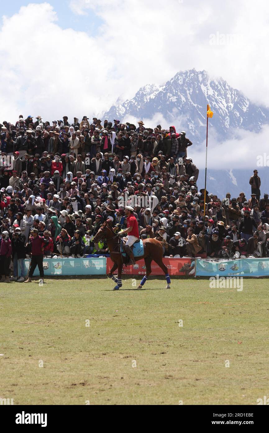 Polo players infront of the crowds at the Shandur Polo Festival Stock ...