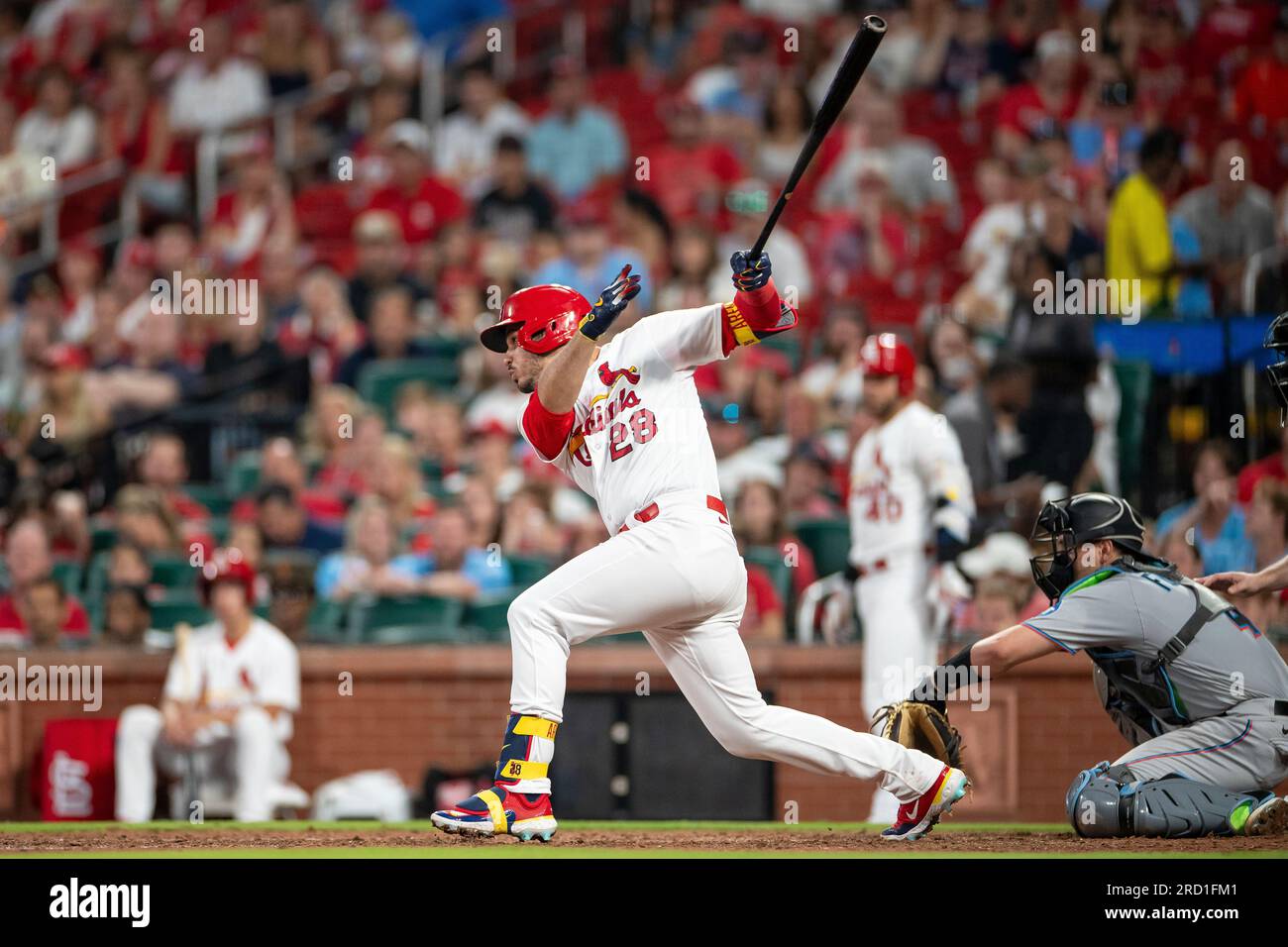 St. Louis Cardinals third baseman Nolan Arenado (28) hits a two-run ...