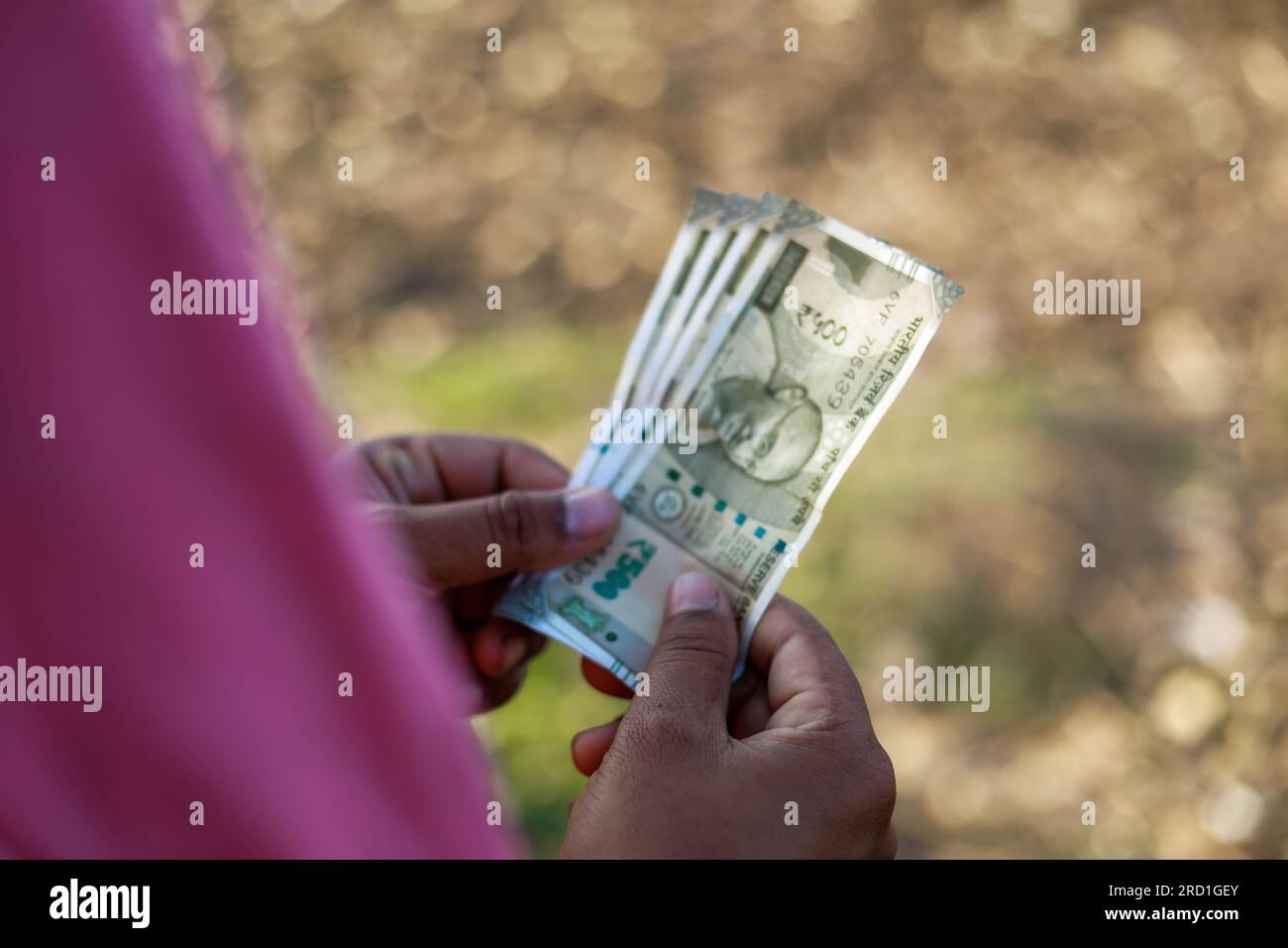 Happy Indian farmer, farmer holding indian rupees in hands, smart ...