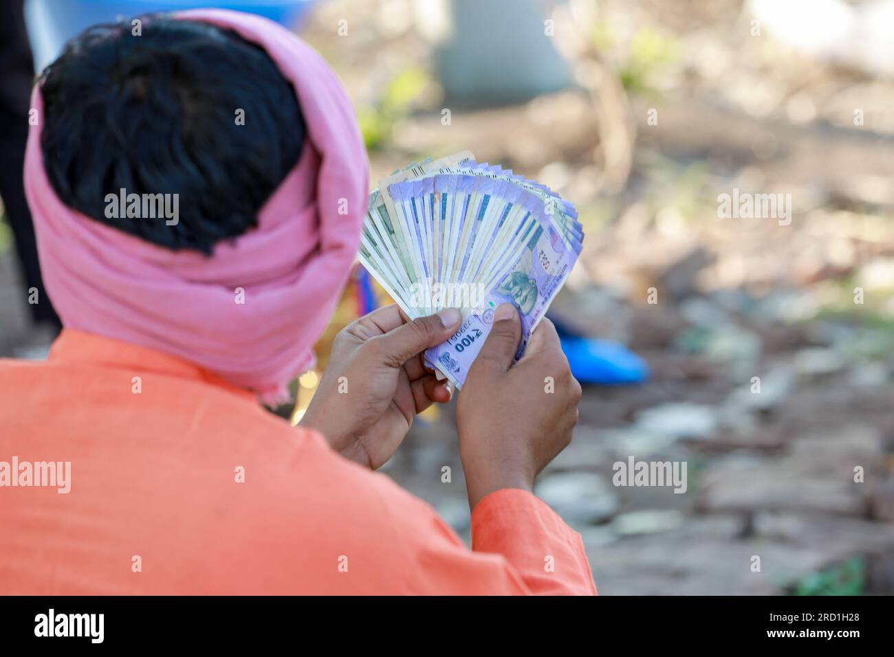 Happy Indian farmer, farmer holding indian rupees in hands, smart ...