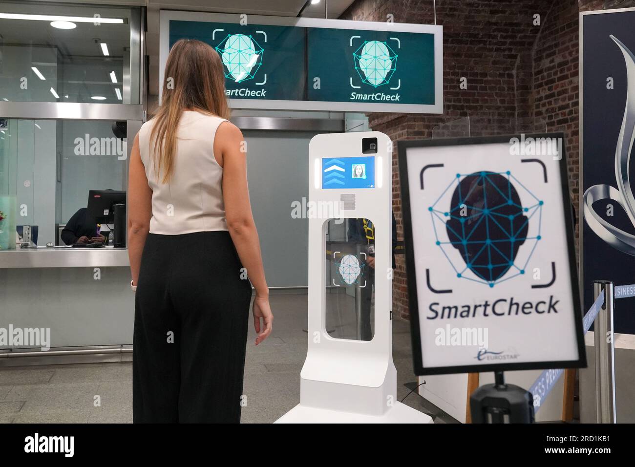 Staff demonstrate the new SmartCheck facial biometric check-in system at the Eurostar terminal ...