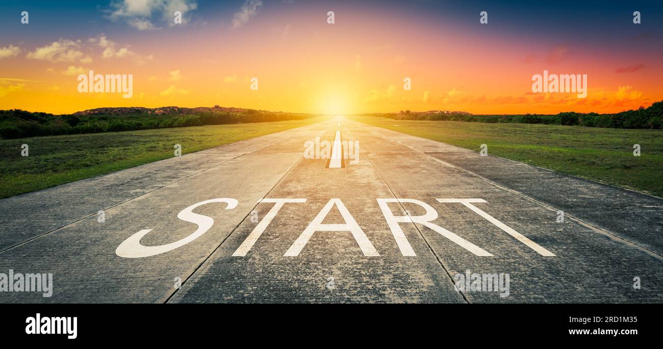 Conceptual image with word start on asphalt road at sunset Stock Photo ...