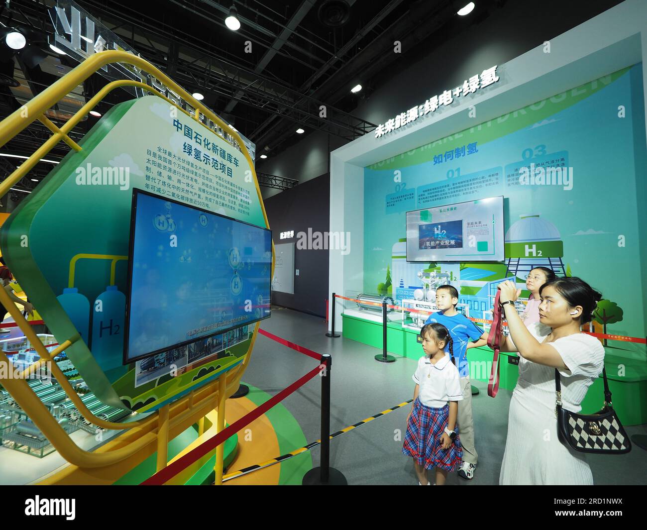 Children visit a science popularization exhibition during summer ...