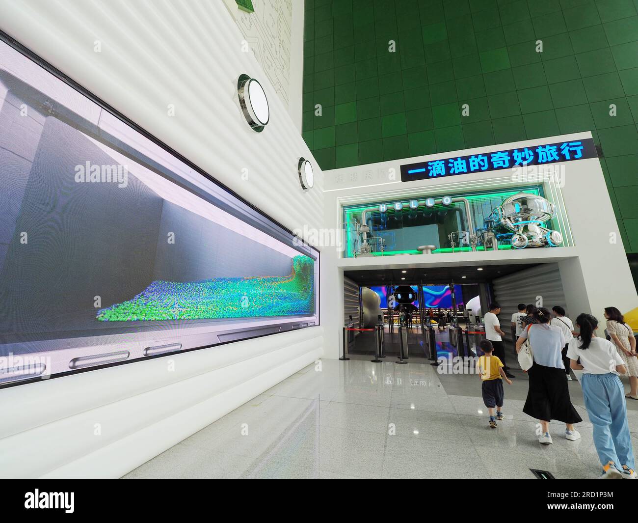 Children visit a science popularization exhibition during summer ...