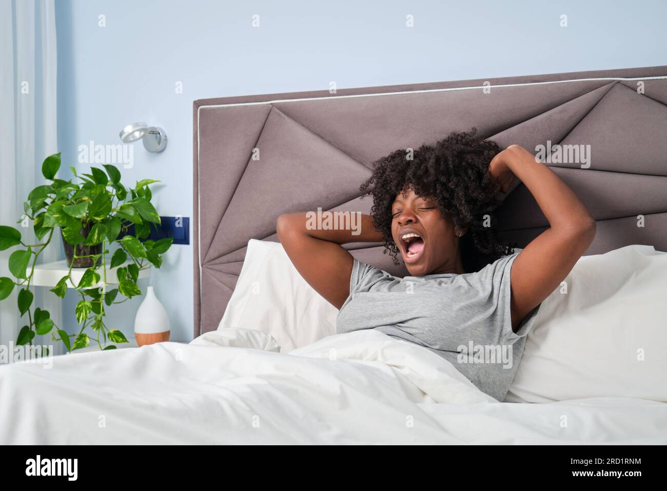 Black woman yawning open mouth hi-res stock photography and images - Alamy