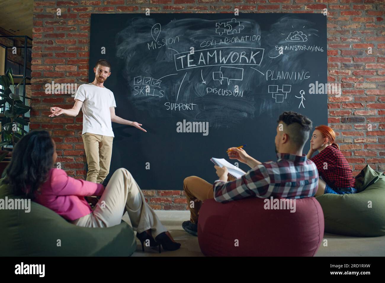 Workshop for employees. Young people, colleagues sitting in class ...