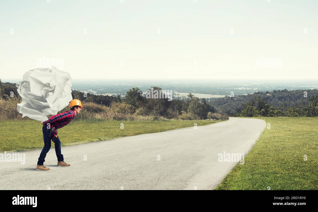 Engineer man carry load Stock Photo - Alamy