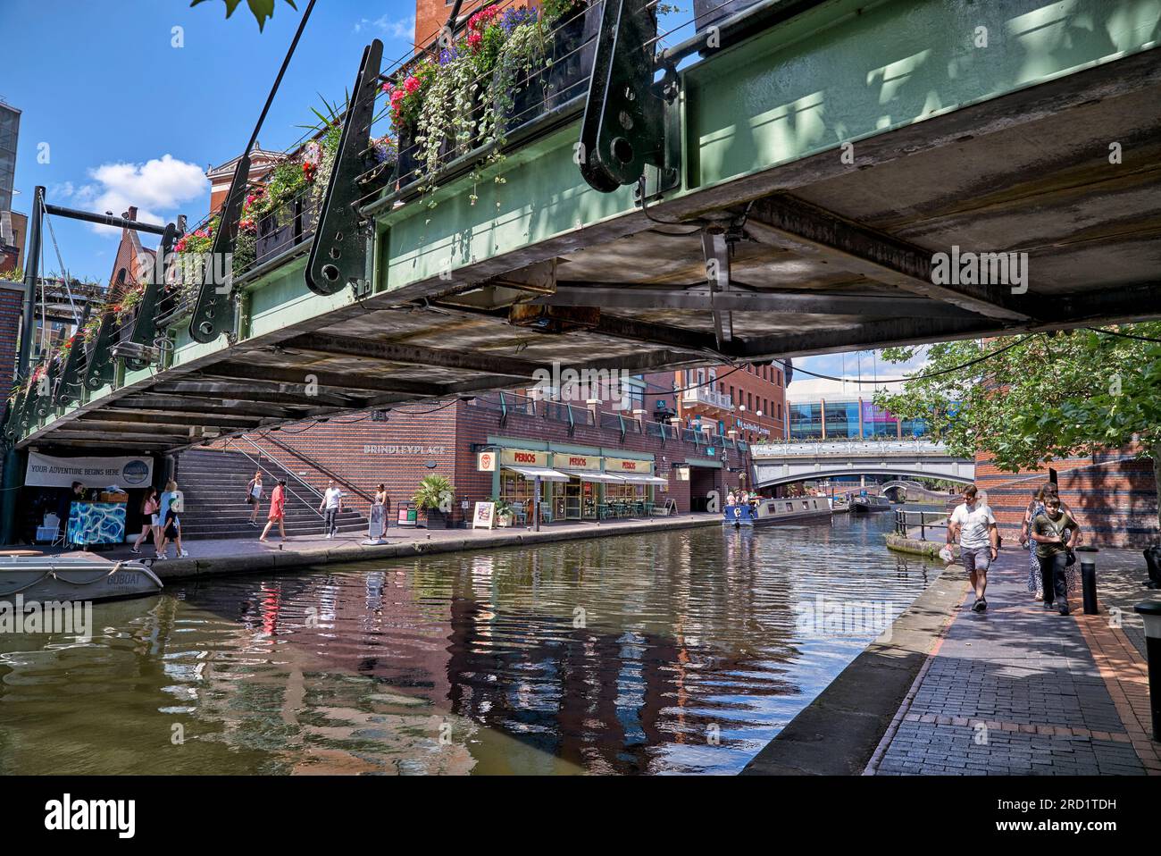 Foot bridge over water at Brindley Place with the Birmingham canal ...