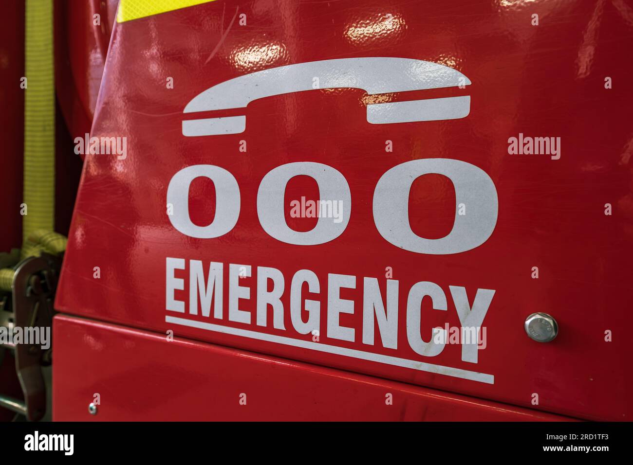 Triple zero emergency help line sign on a fire truck Stock Photo - Alamy