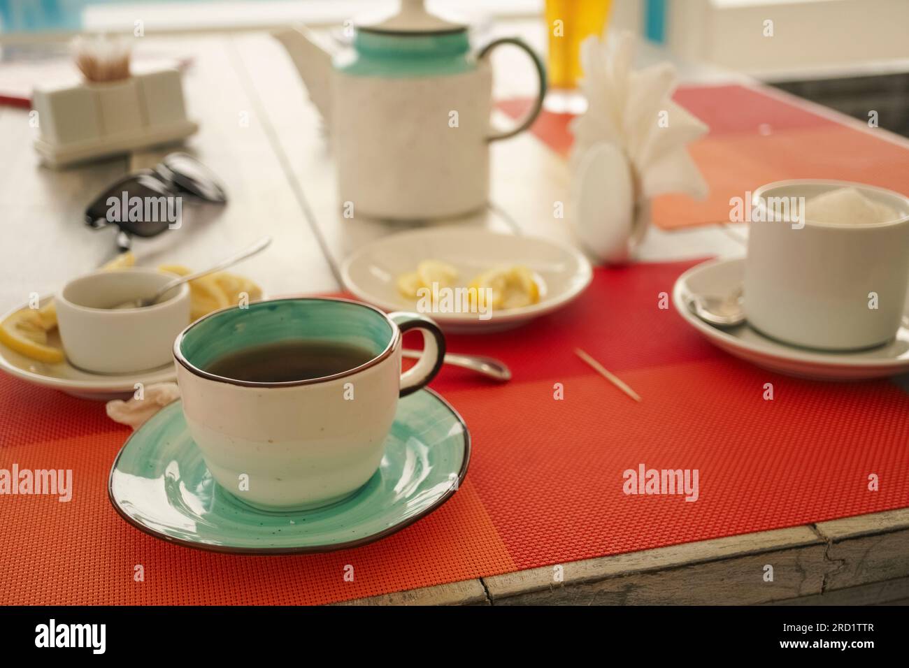 tea drinking in a cafe serving vintage crockery, tea with lemon and ...