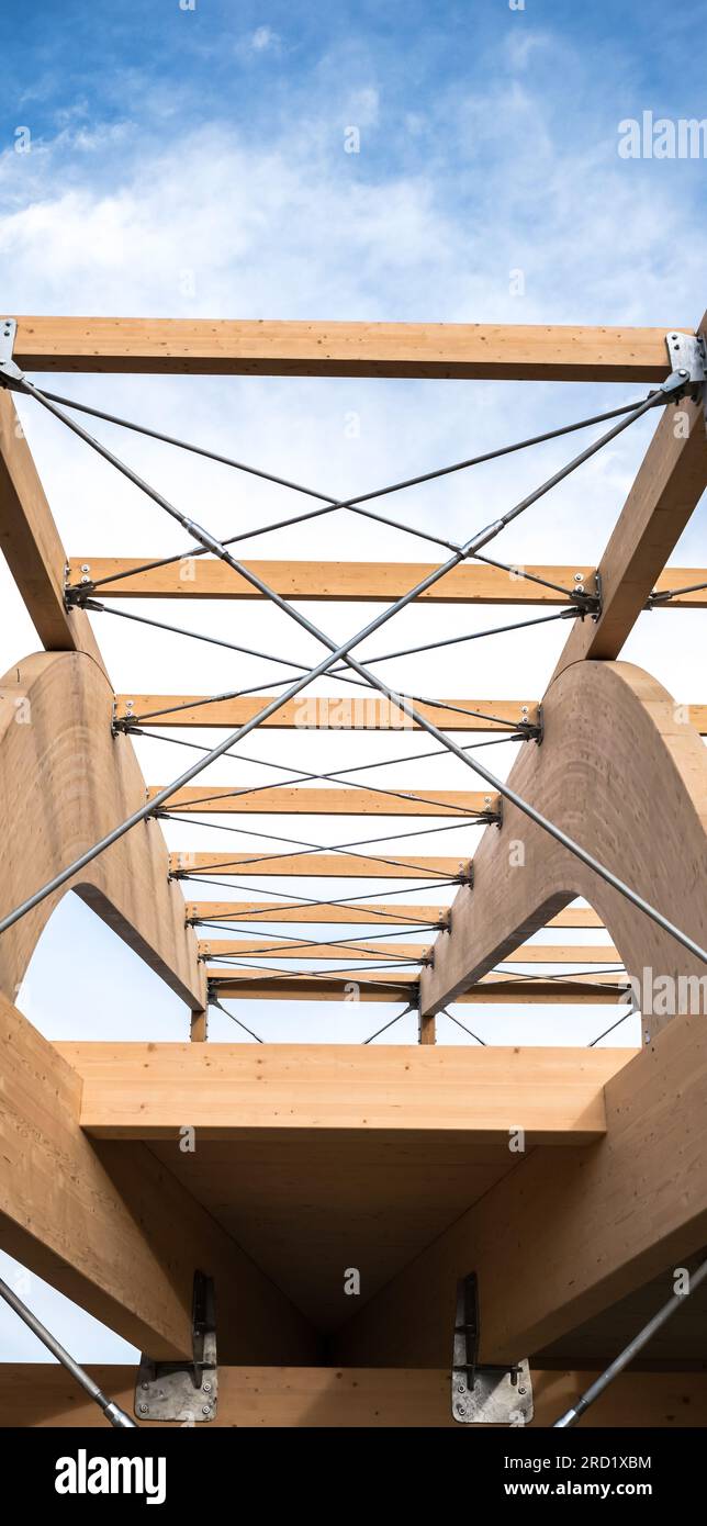 Detail of a modern wooden architecture in glued laminated timber on a ...