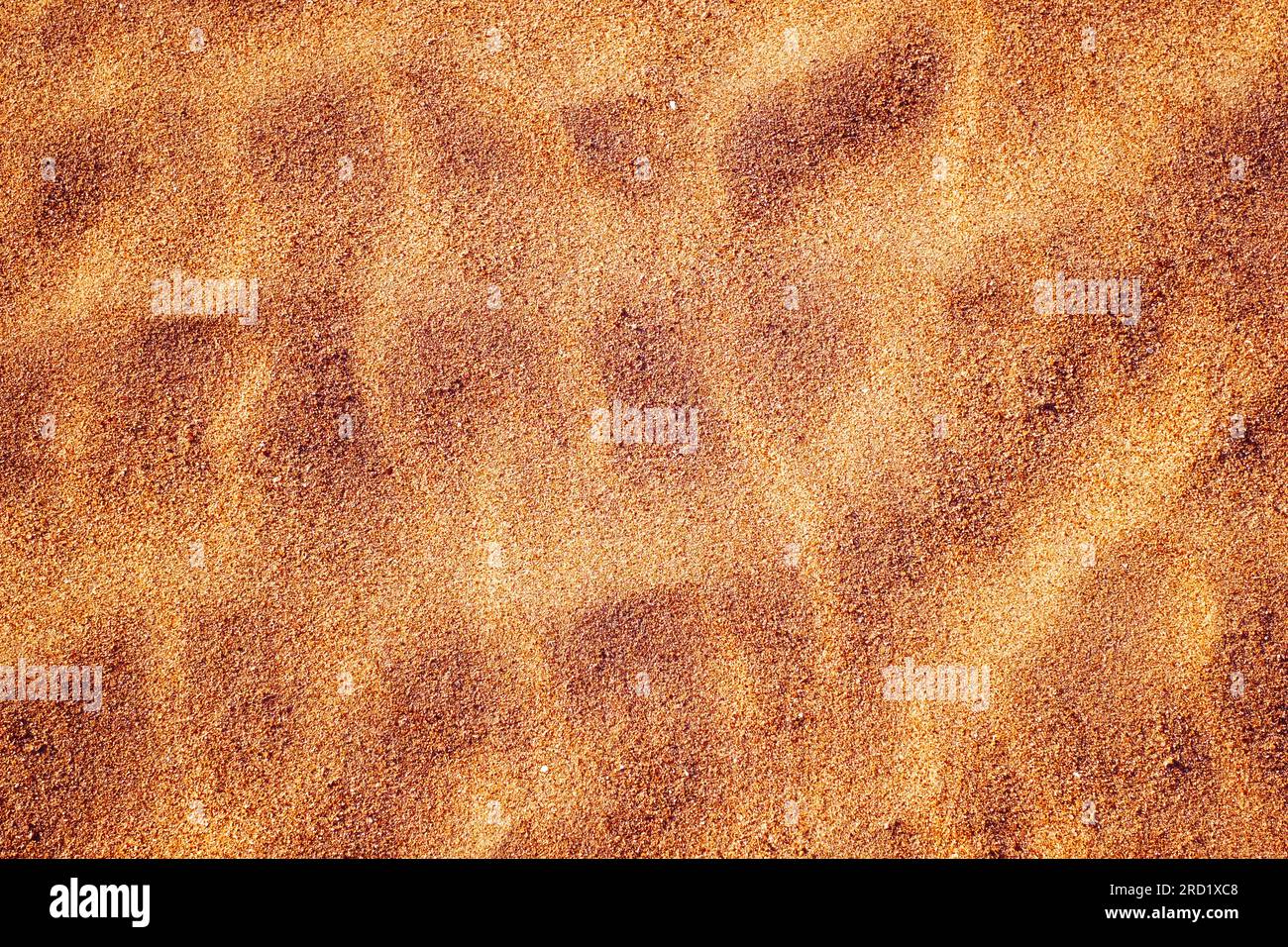 Golden sand texture at the beach Stock Photo - Alamy