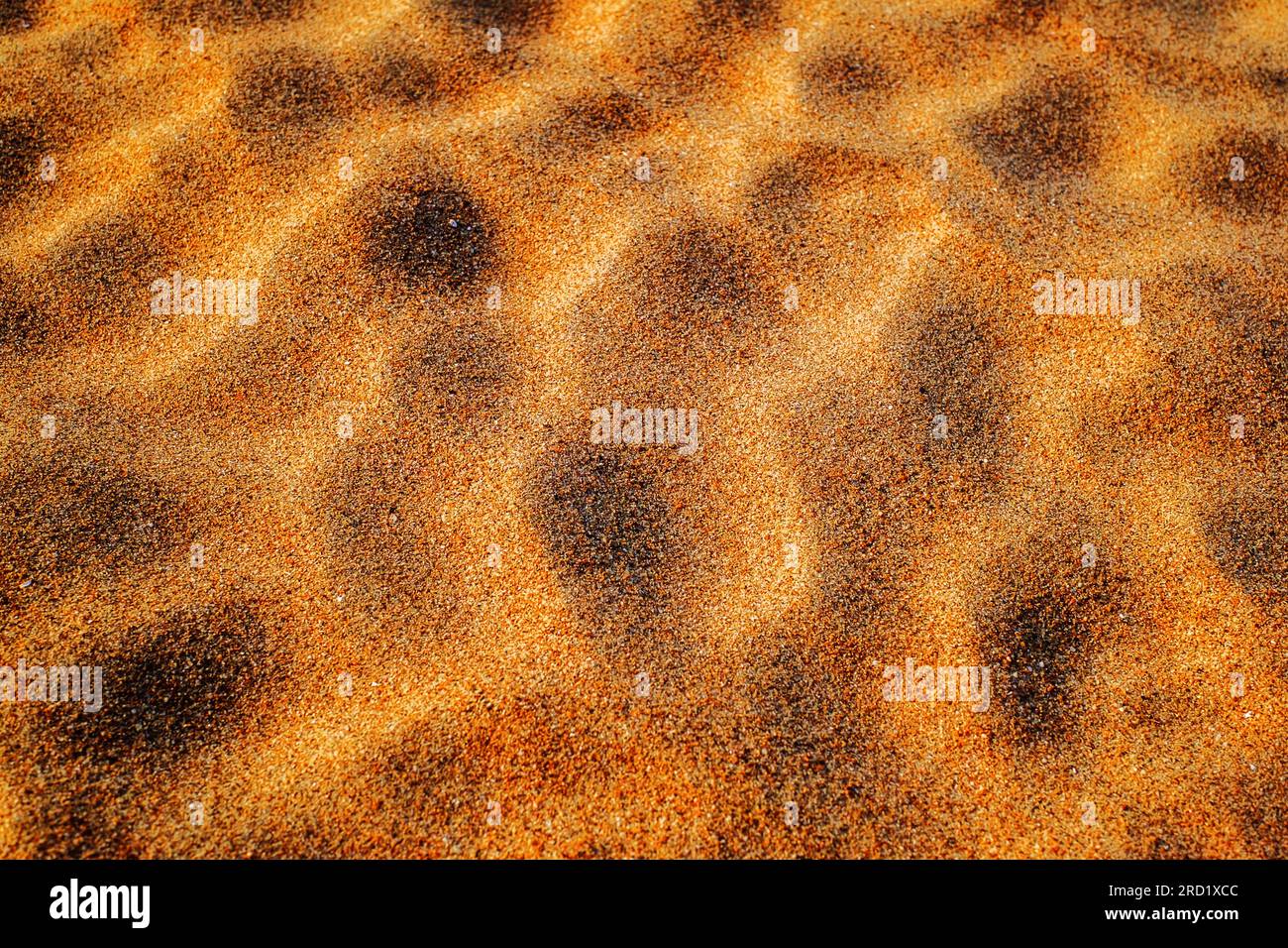 Golden sand texture at the beach Stock Photo - Alamy