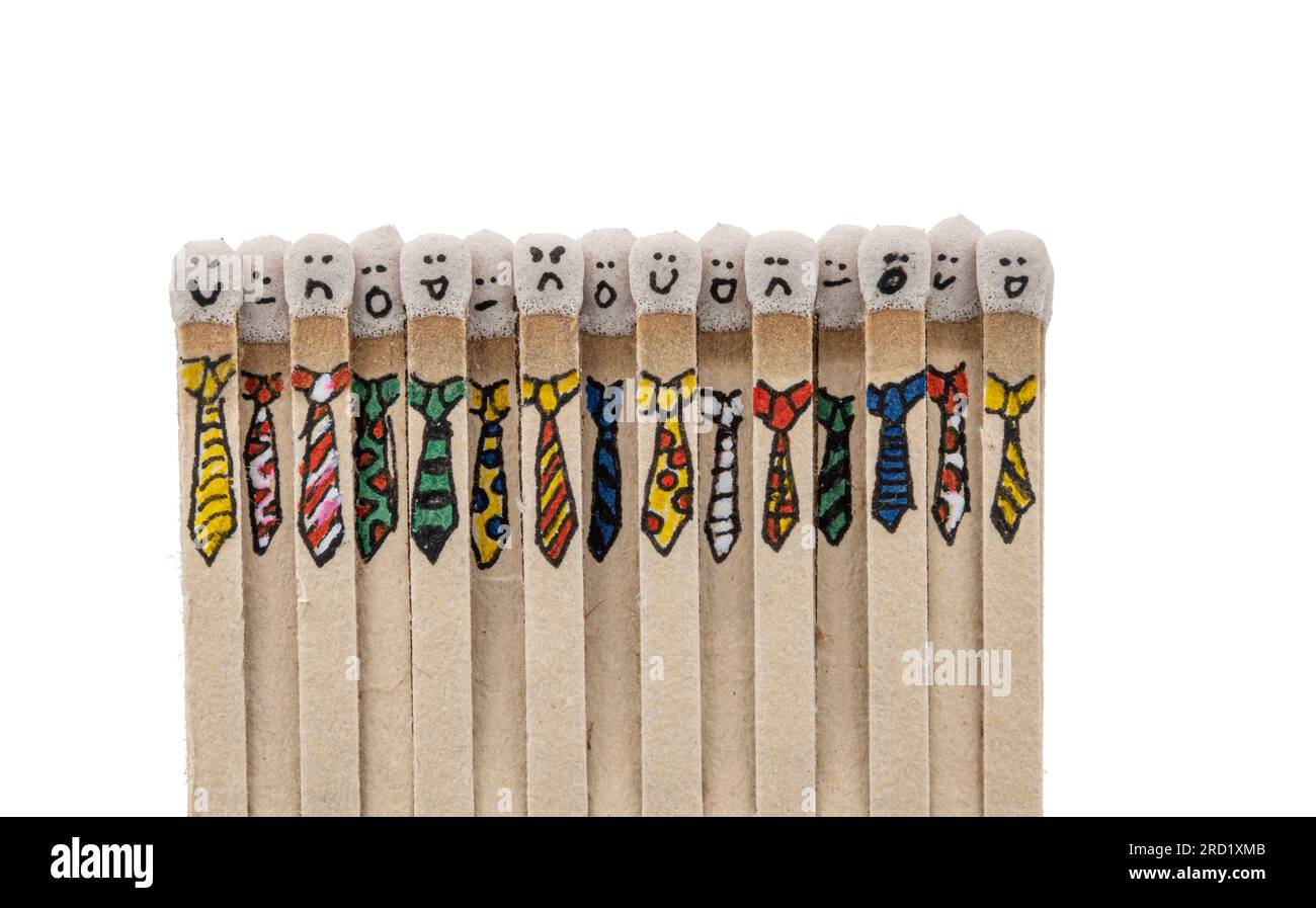 matchsticks with faces painted on the heads on white background Stock ...