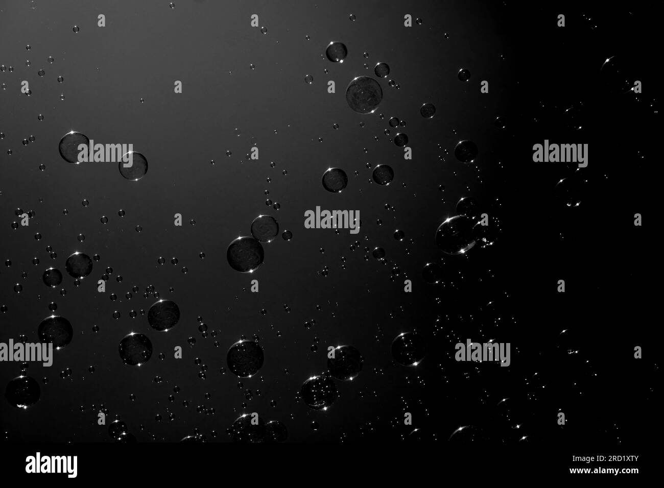 Water bubbles cosmetic liquid Black and White Stock Photos & Images - Alamy