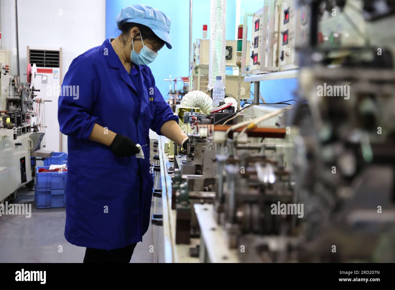BINZHOU, CHINA - JULY 17, 2023 - A worker produces high-voltage silicon ...