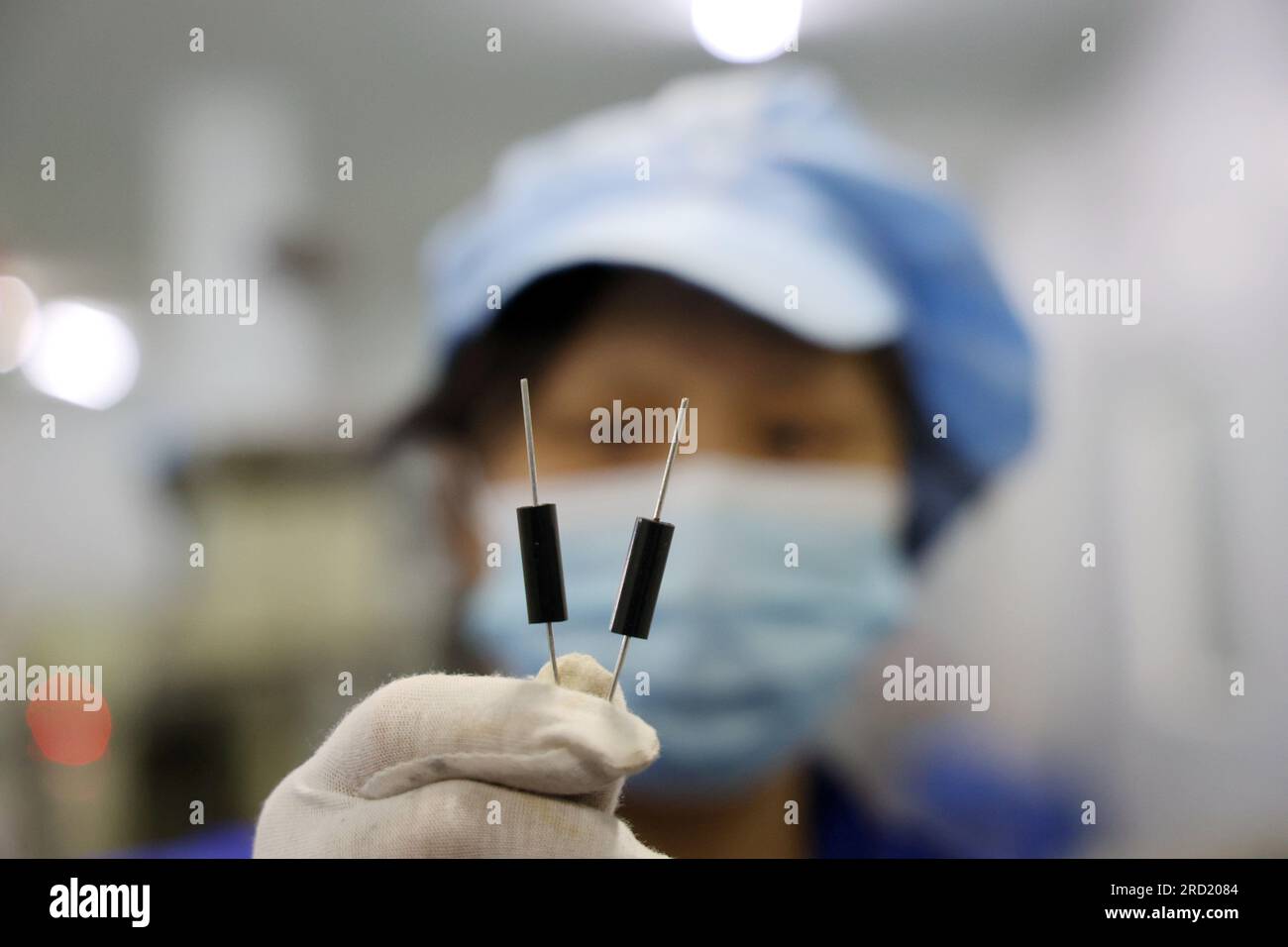 BINZHOU, CHINA - JULY 17, 2023 - A worker produces high-voltage silicon ...