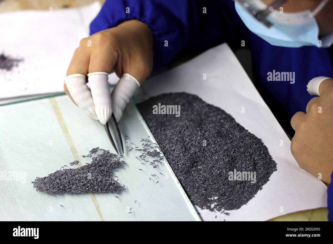 BINZHOU, CHINA - JULY 17, 2023 - A worker produces high-voltage silicon ...